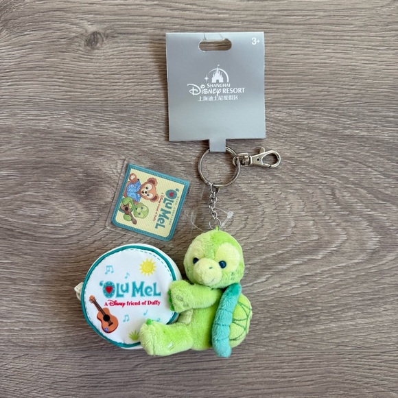 Disney | Accessories | Shanghai Disneyland Exclusive Olu Mel Plush ...